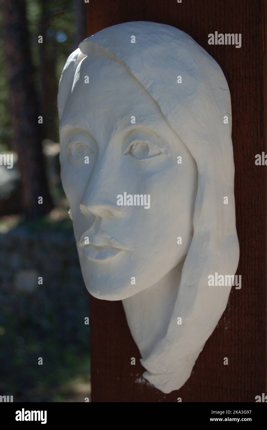 The art in the park- The Statue of Woman's Face Stock Photo - Alamy