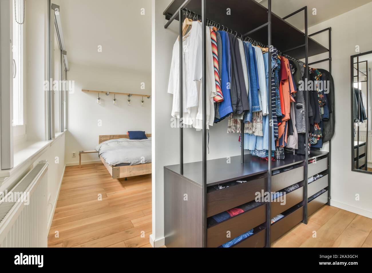 Interior of a dressing room of a modern house with clean and folded ...