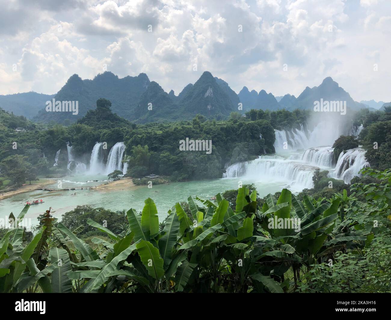 A breathtaking shot of Detian waterfalls in very beautiful green ...