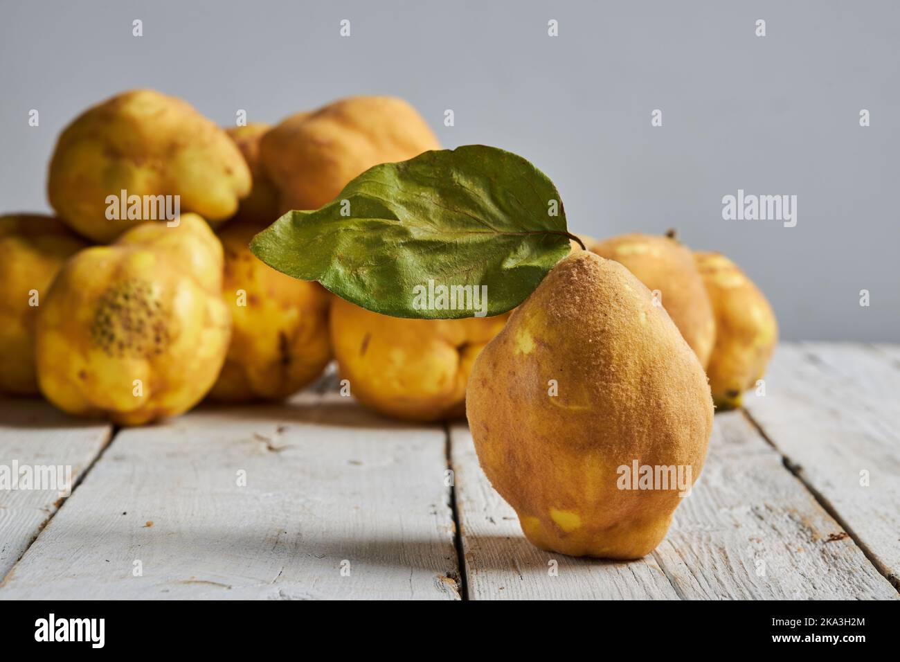 Fresh whole sour yellow lemons on white wooden background Stock Photo ...