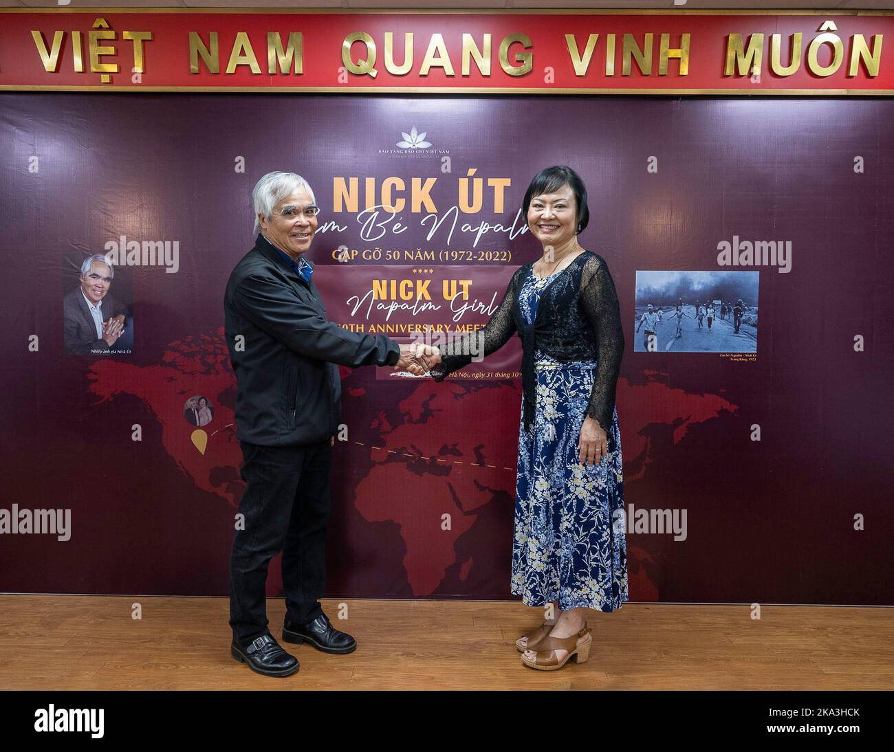 Hanoi, Vietnam. 31st Oct, 2022. Nick Ut and Kim Phuc sake hands at an ...