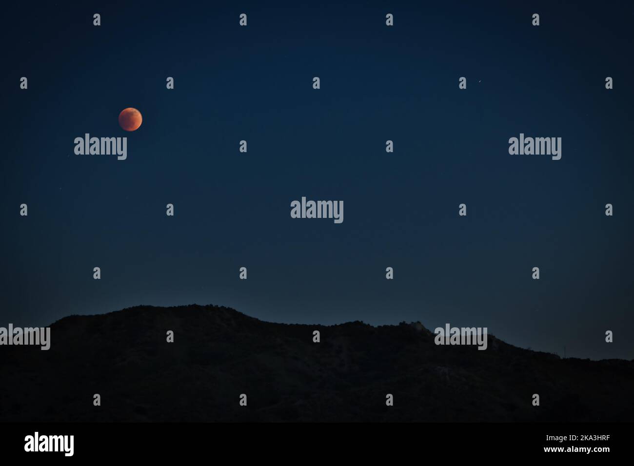 A mysterious view of a night sky with red moon in Los Angeles ...