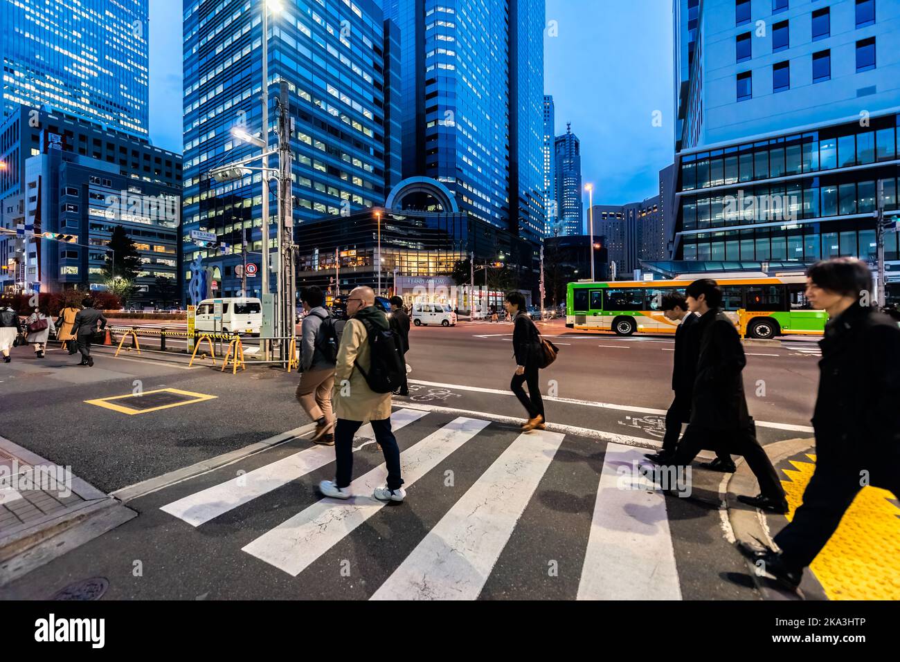 Shinjuku, Japan - April 1, 2019: People, businessmen crossing crosswalk ...