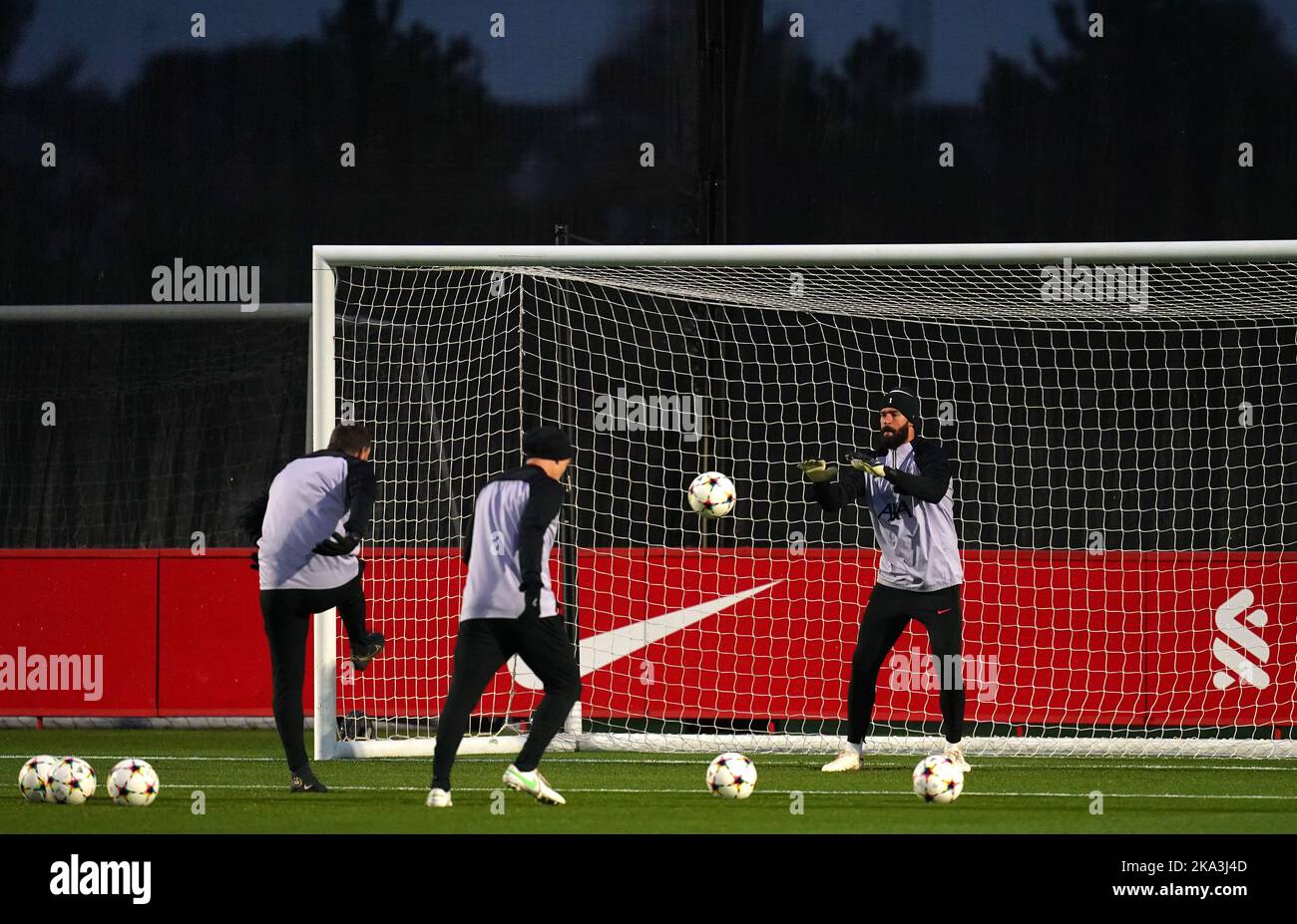 Liverpool goalkeeper Alisson Becker (right) during a training session ...