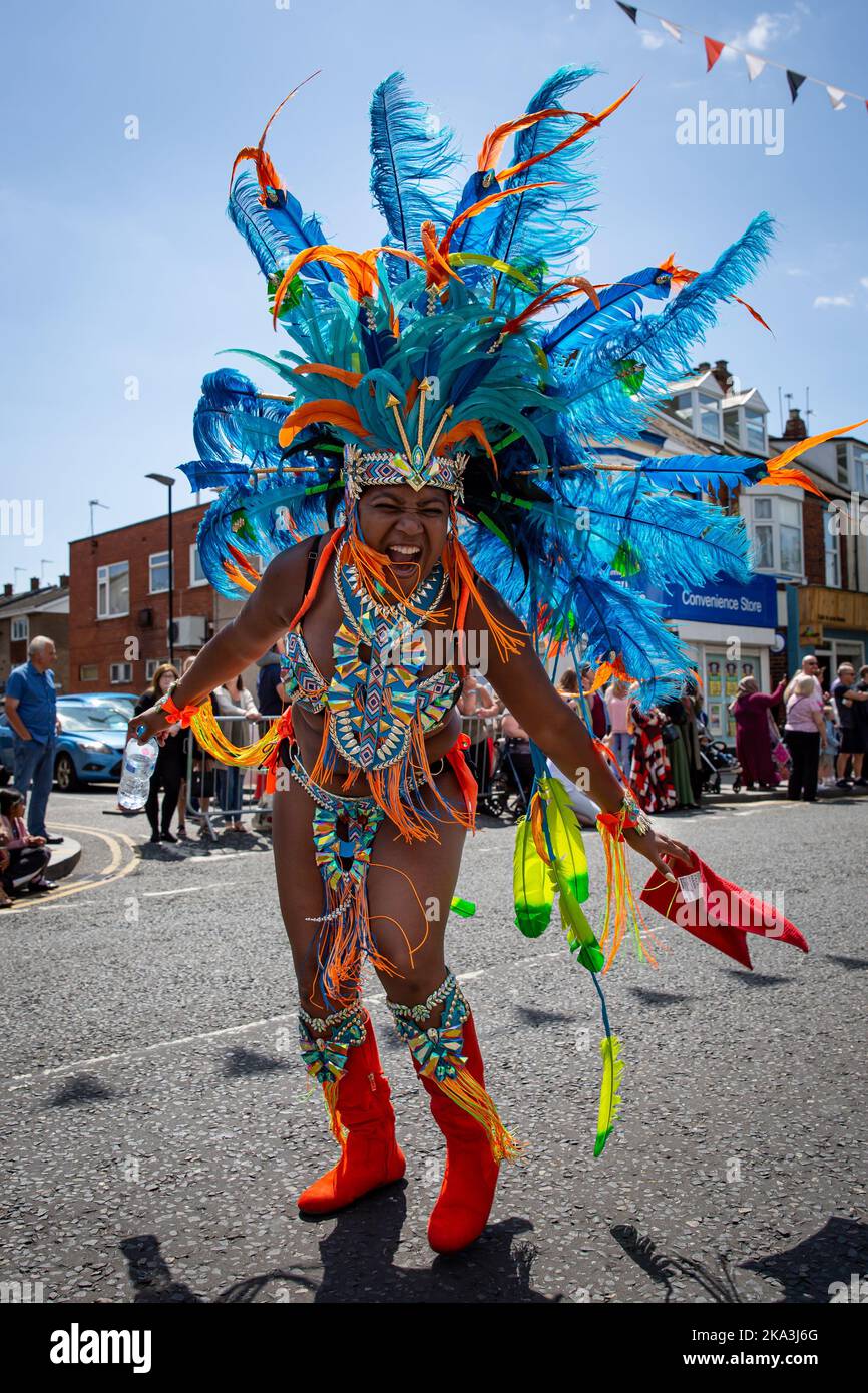The people in colorful dresses performing at Fair Fun and Dancing in ...