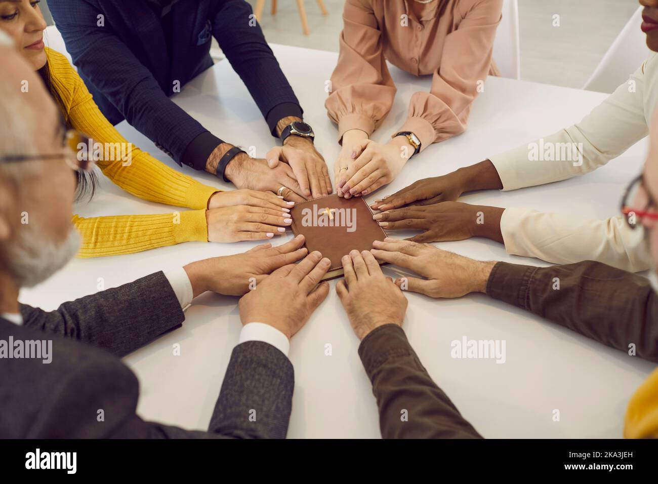 Diverse people holding hands trust hi-res stock photography and images - Alamy