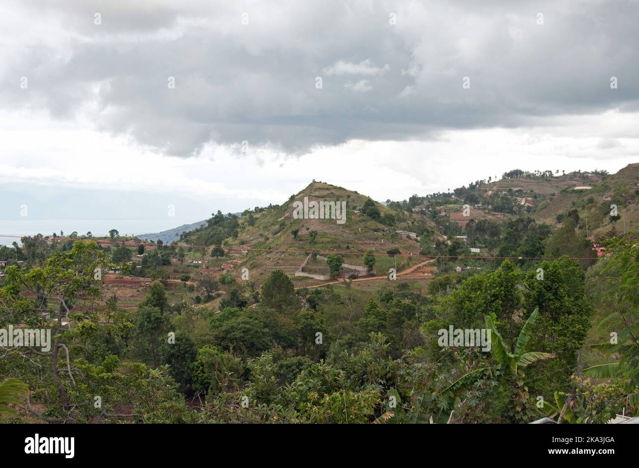 Countryside around Port-au-Prince, Haiti. Vegetation in some areas is ...