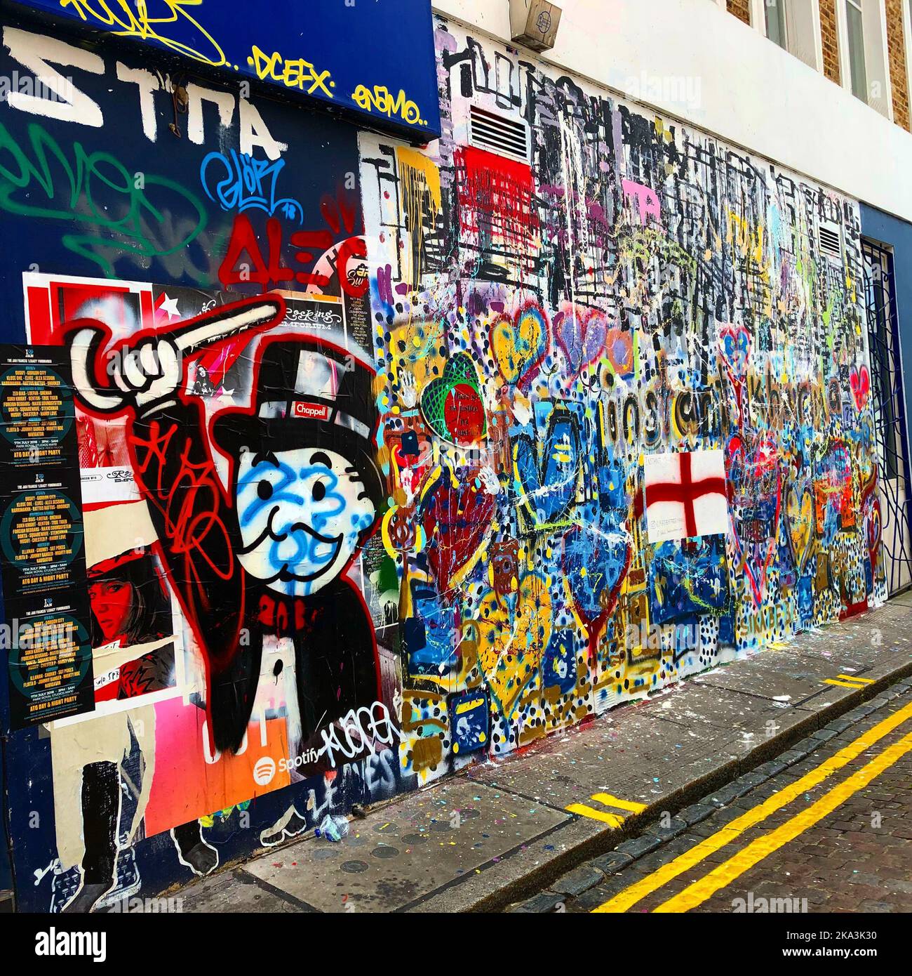 A beautiful shot of a wall full of graffiti art on the streets of ...