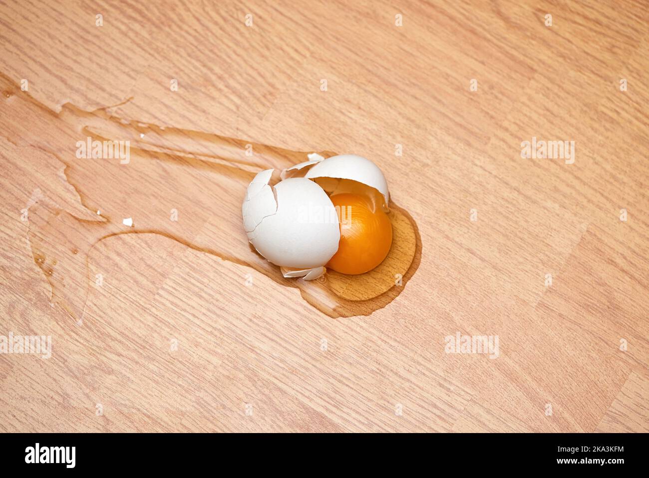 Cracked egg on floor hi-res stock photography and images - Alamy