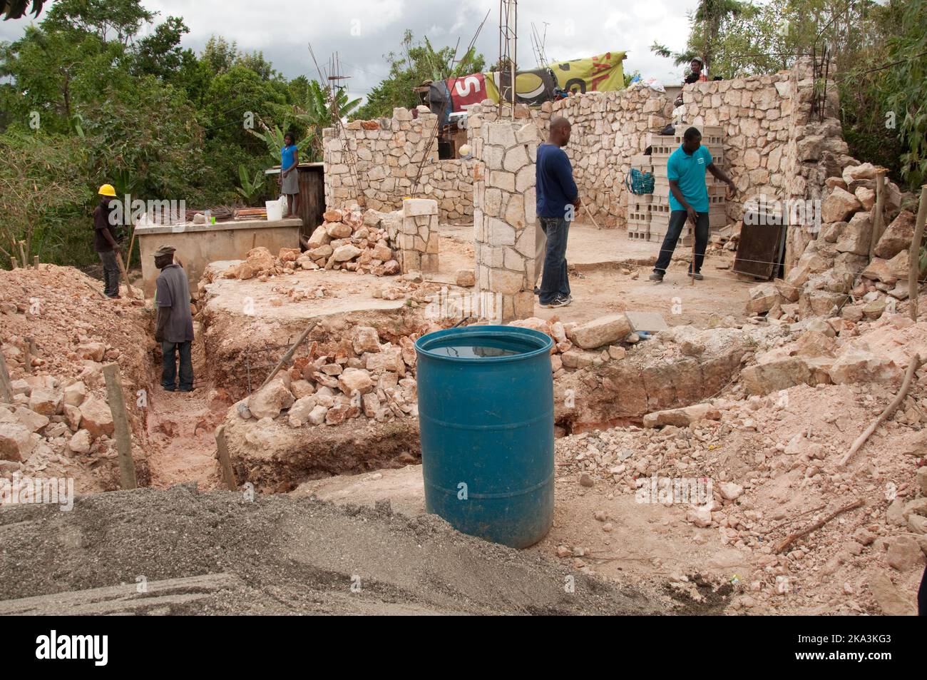 Workmen Rebuilding House Destroyed by the Earthquake, Port-au-Prince ...