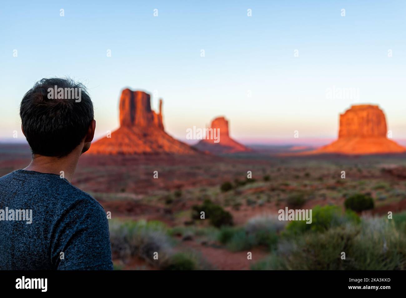 Back view man looking monument valley hi-res stock photography and ...