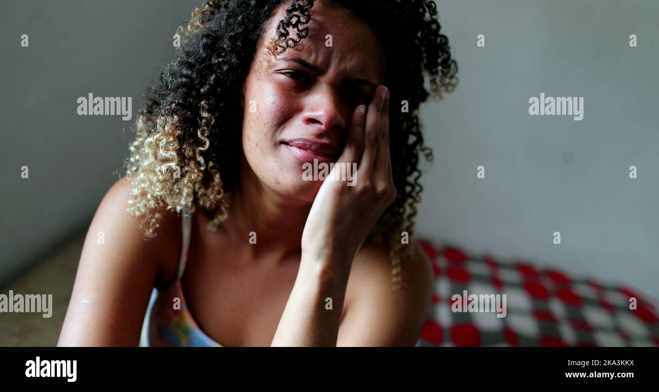 Desperate depressed woman crying in despair, crying person hispanic ...