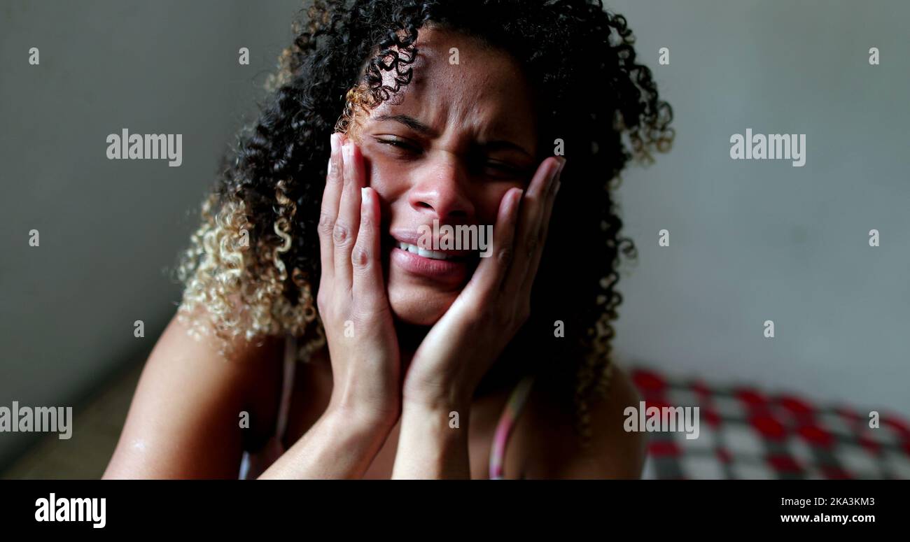 Desperate depressed woman crying in despair, crying person hispanic ...