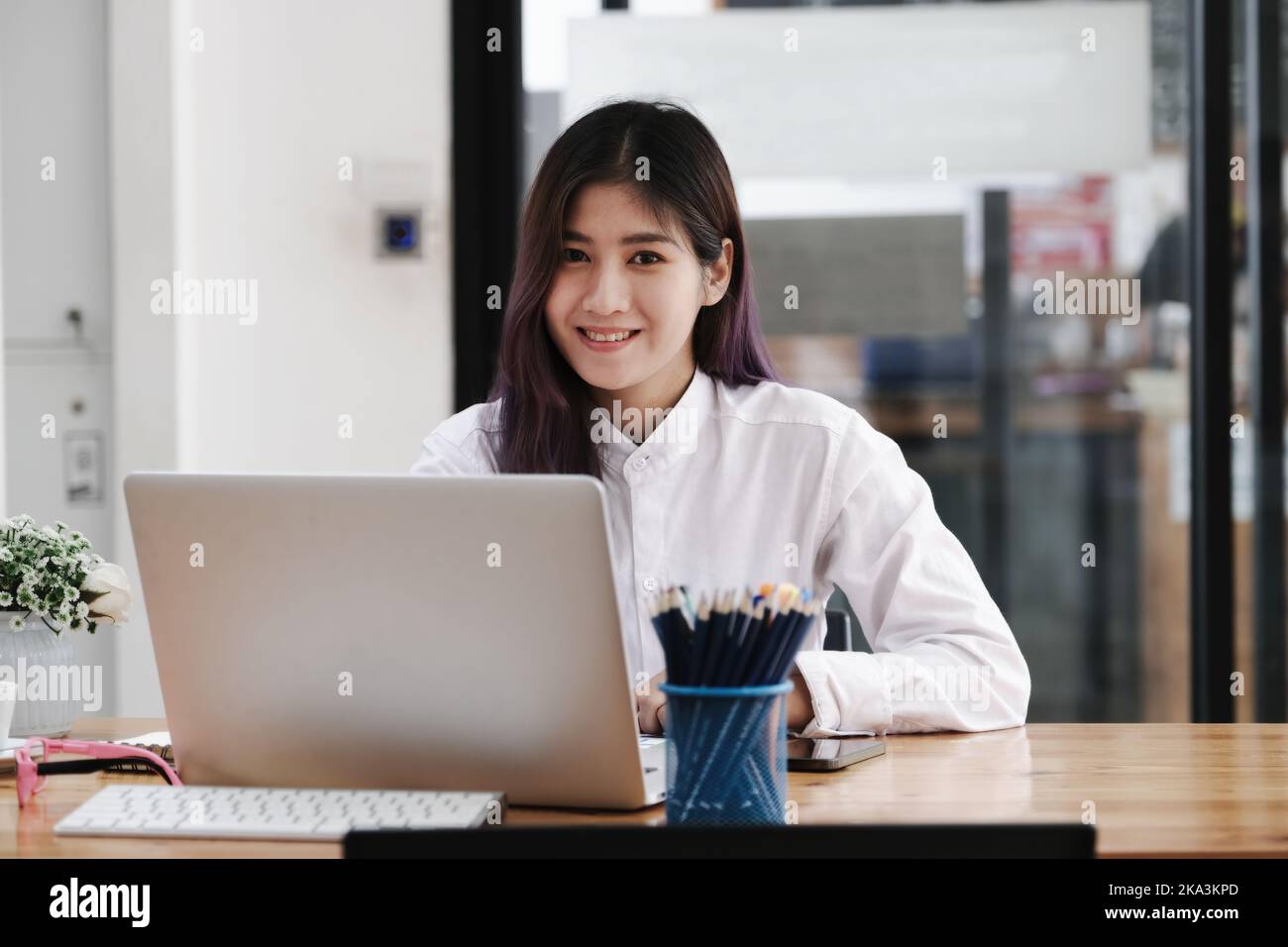 new normal, a businesswoman useing computer to work for a company Via ...