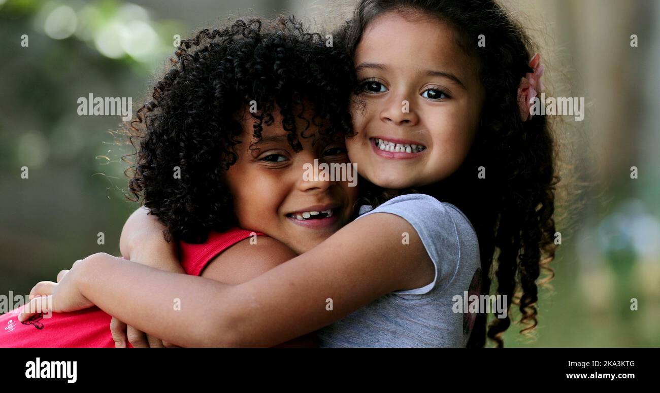 Children hugging love and affection. Mixed race diverse ethnicity Stock ...