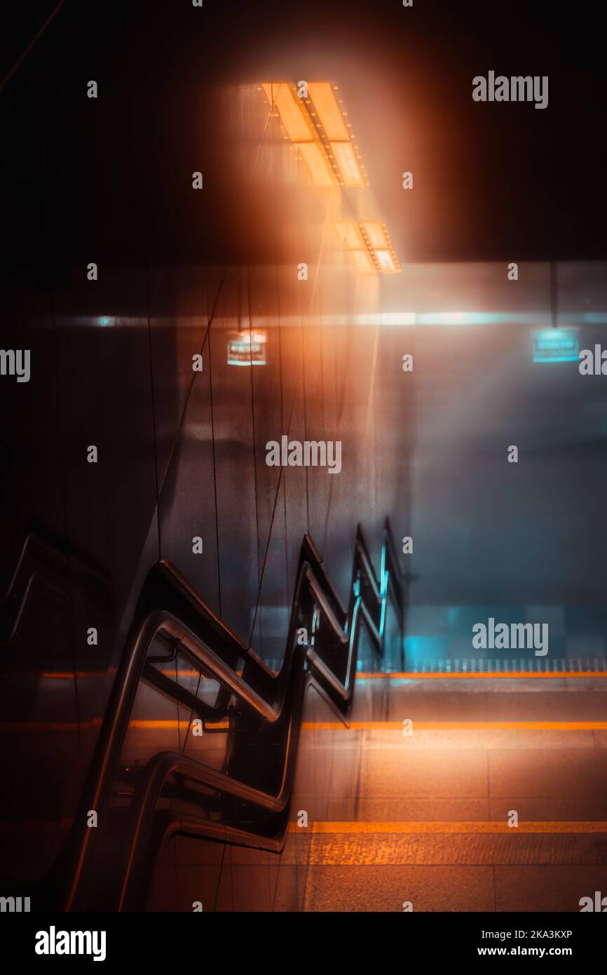 The metallic stairs with blue and yellow neon lights Stock Photo - Alamy