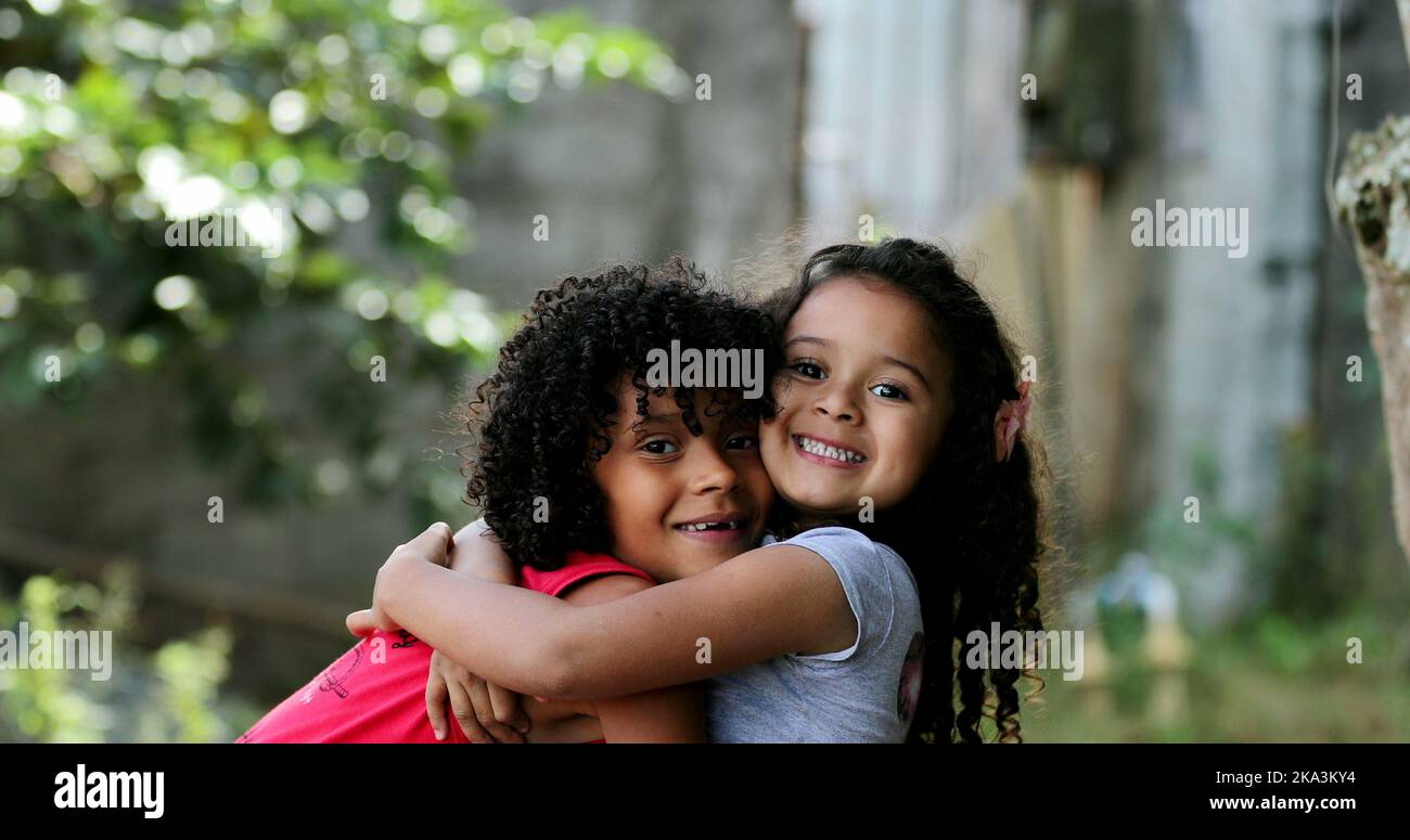 Children hugging love and affection. Mixed race diverse ethnicity Stock ...