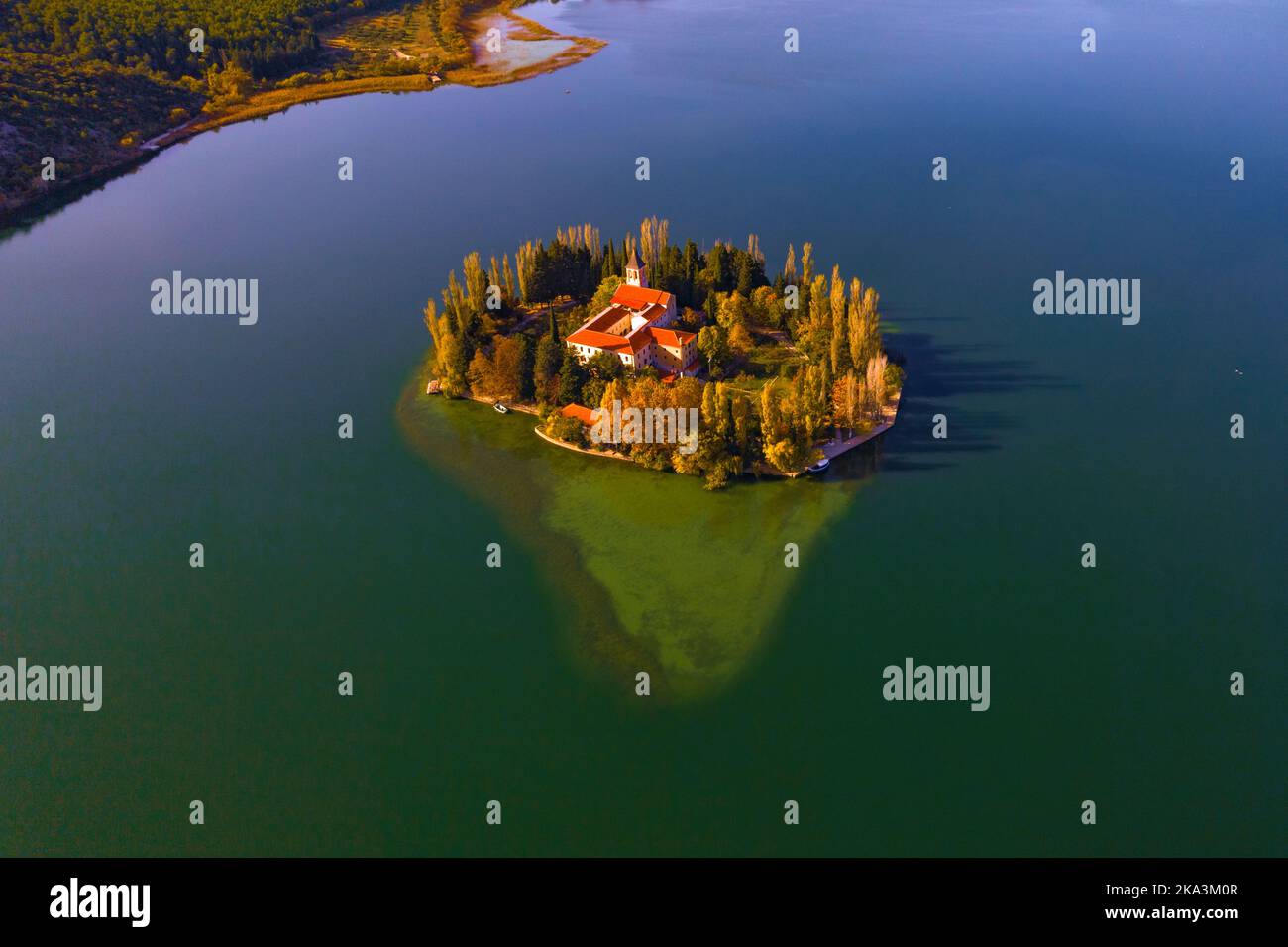 The autumn on Visovac Island and the Visovac Monastery in Krka National ...