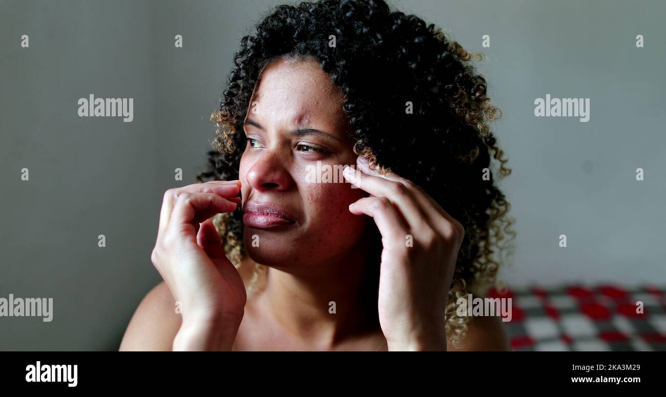 Women praying crying hi-res stock photography and images - Alamy