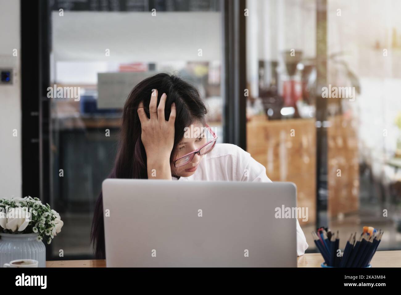 Employees show signs of boredom from working full time Stock Photo - Alamy