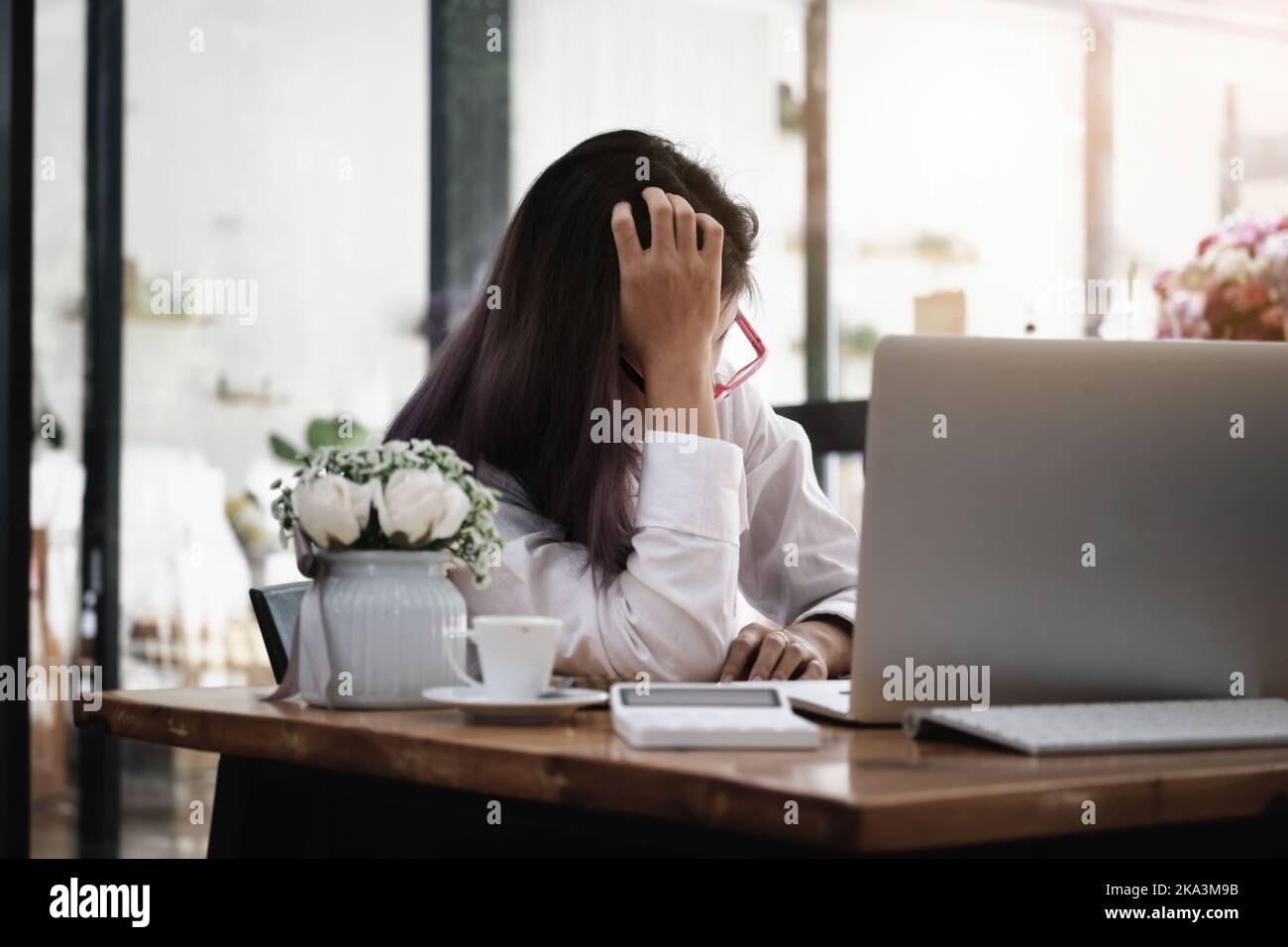 Employees show signs of boredom from working full time Stock Photo - Alamy