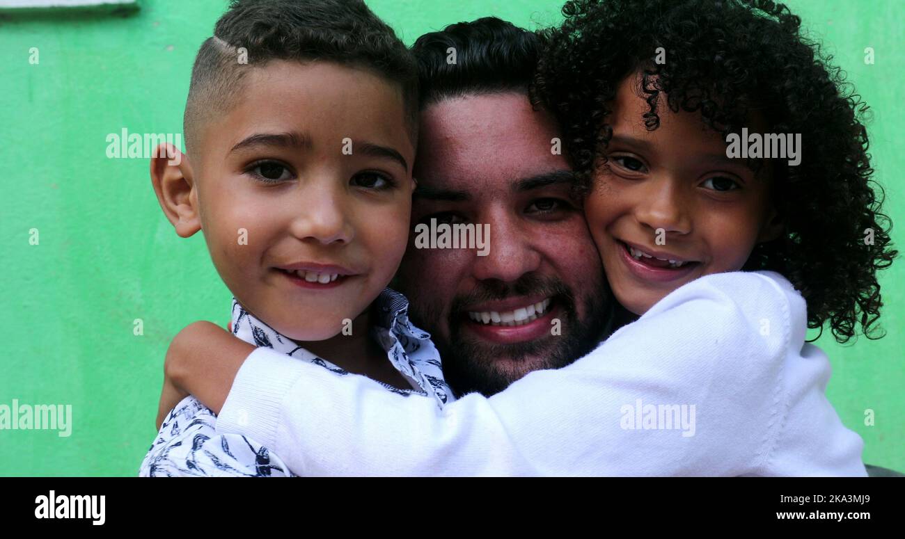 Father and children embrace, real love and affection. South american ...