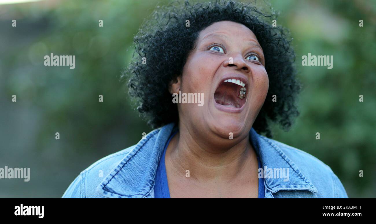 Happy African hispanic woman laugh and smile Stock Photo - Alamy