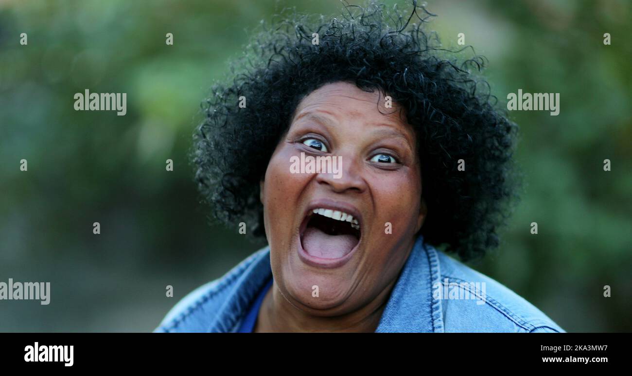 Happy African hispanic woman laugh and smile Stock Photo - Alamy