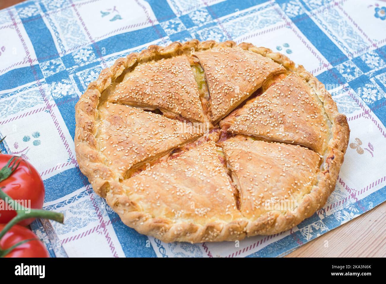 traditional pie, covered pizza baked in wood with wood Stock Photo - Alamy