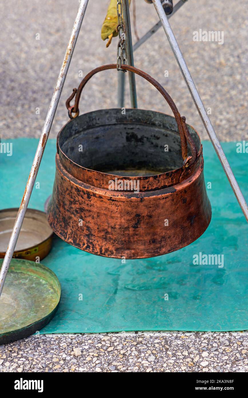 Copper Metal Cauldron Pot With Handle Hanging From Tripod Stock Photo ...