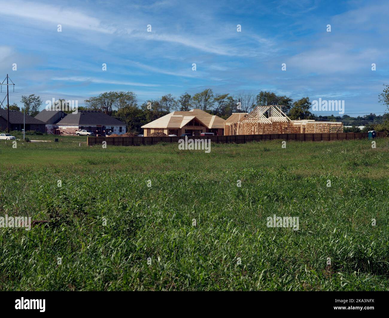 A new housing development spreads across farmland in southwest Missouri ...