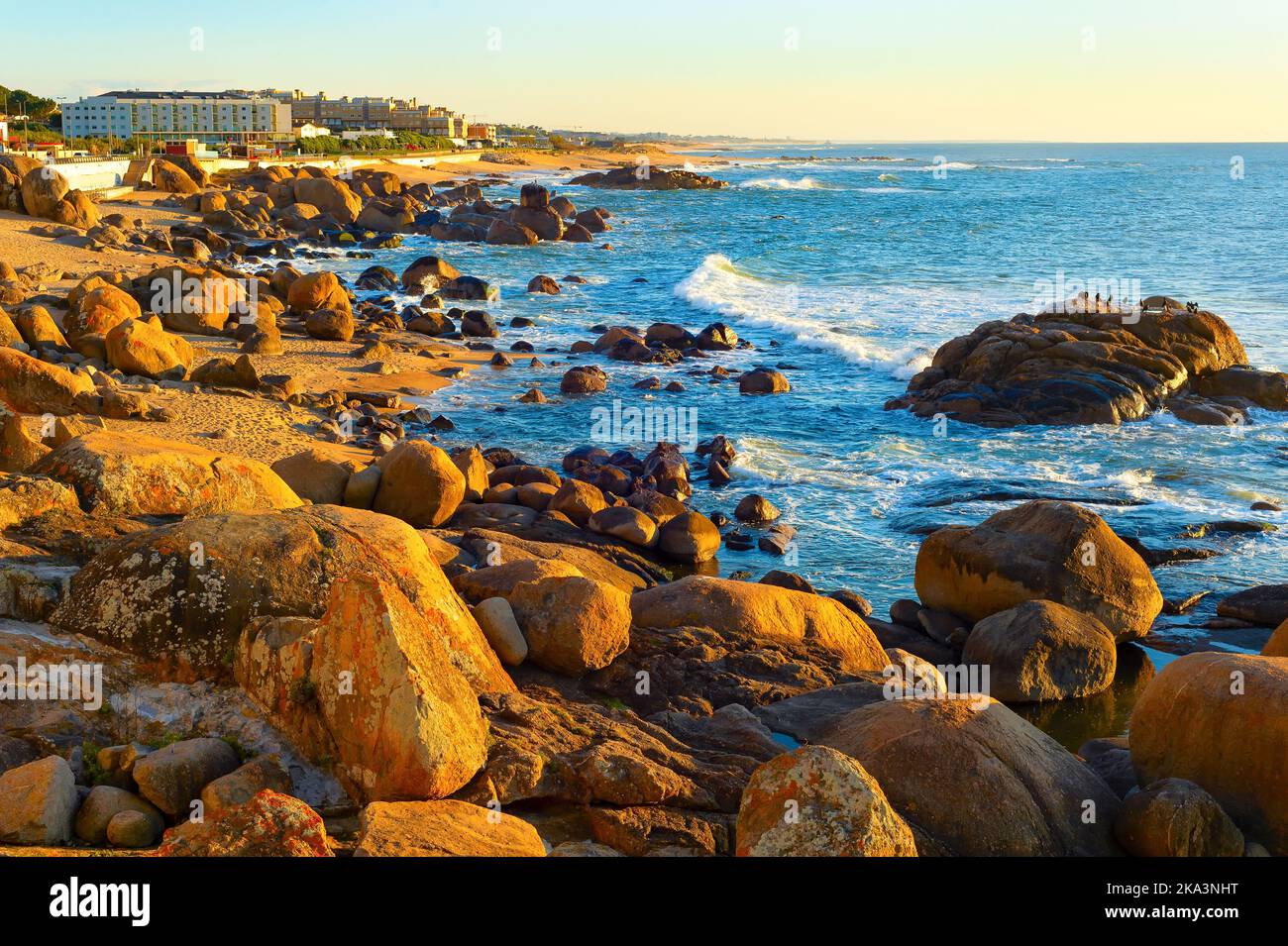 Lavadores beach view with rocks, modern apartments buildings by ...