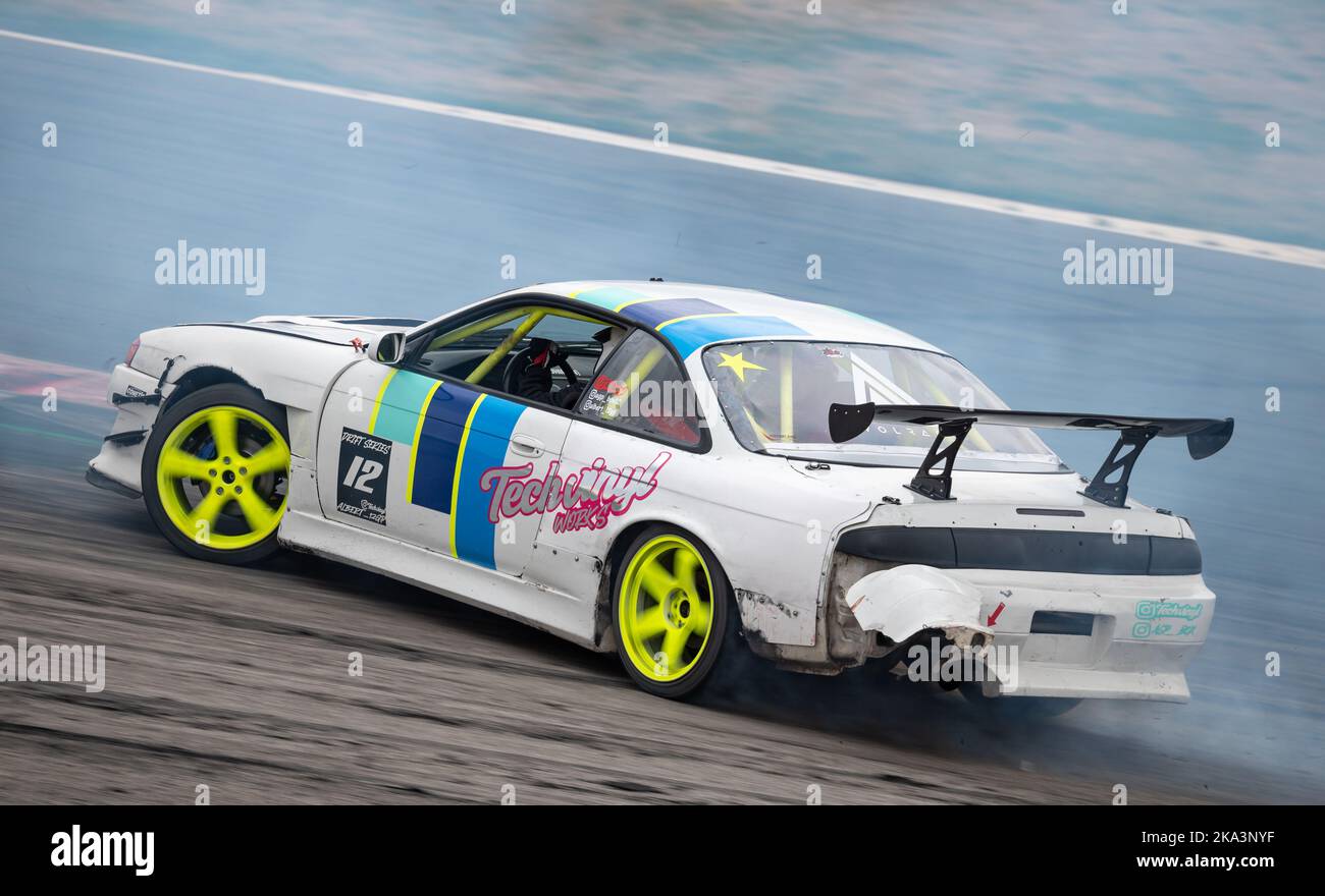 Nissan Silvia S14 drifting on the racing circuit Stock Photo - Alamy