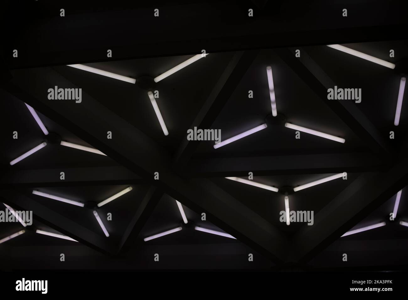 Light in dark. Lamps on ceiling. Interior design. Texture from ...