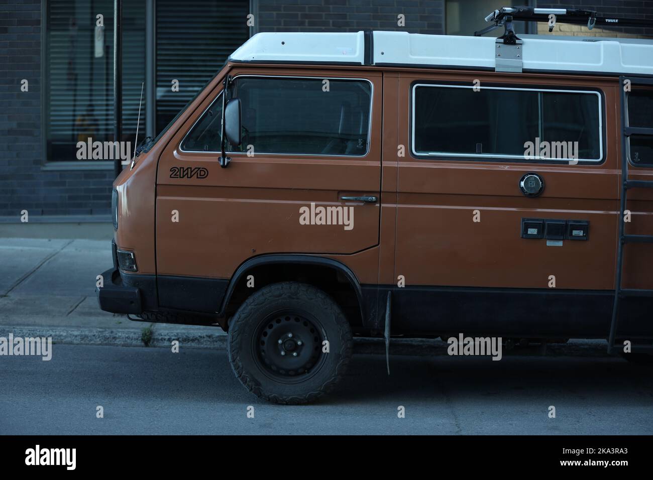 An old travelling brown van parked in Old Montreal, Canada Stock Photo ...