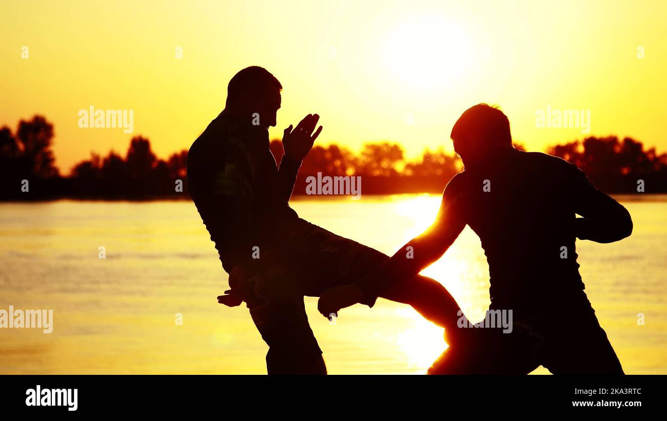 Shadows two people fighting hi-res stock photography and images - Alamy