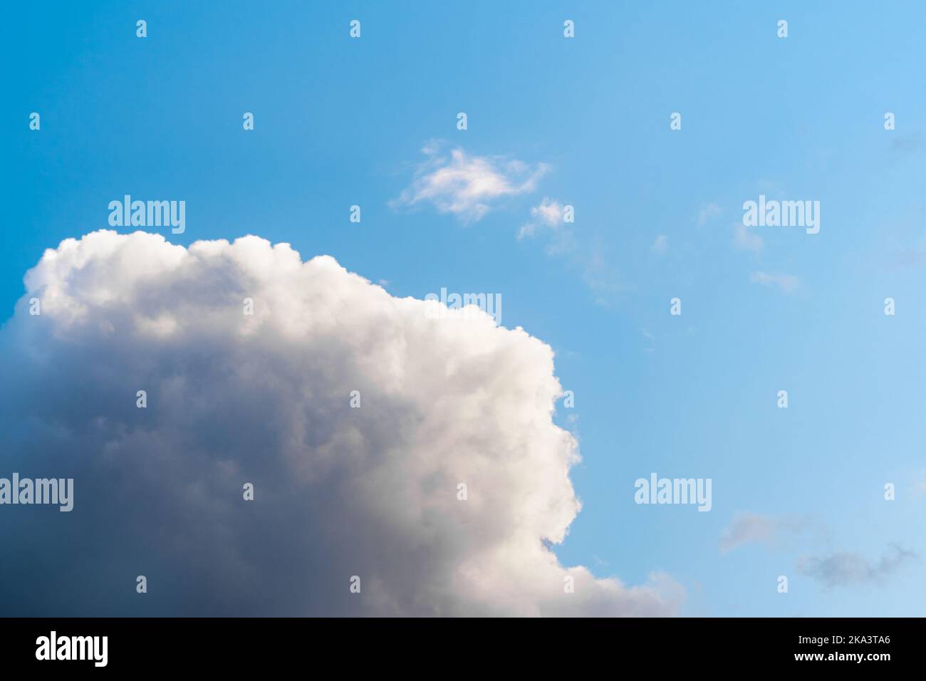 A blue sky background with white clouds Stock Photo - Alamy