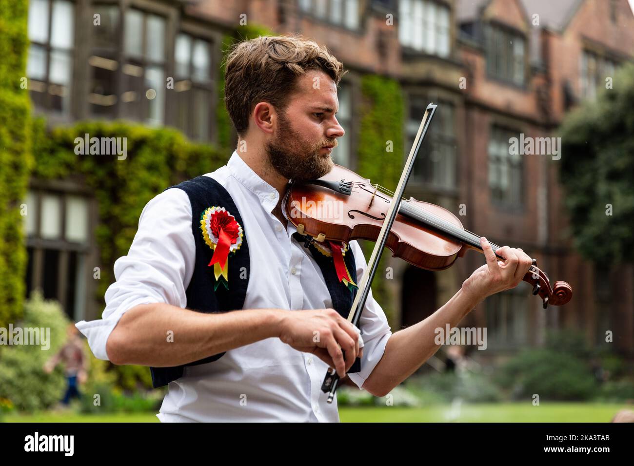 A Caucasian male playing violin at Fair Fun and Dancing in South ...