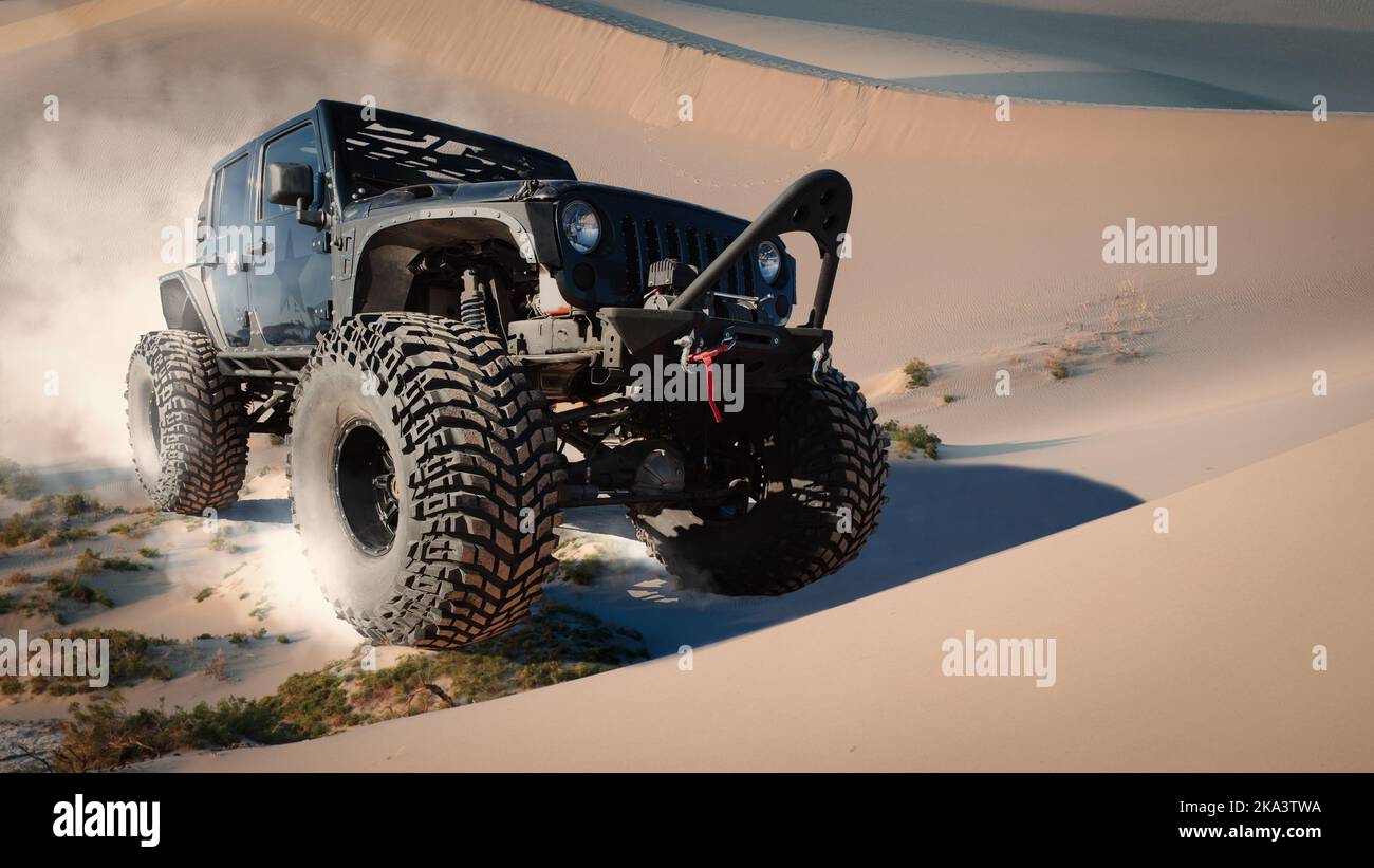 4x4 vehicle driving in the sand dunes, Death Valley, California, USA ...
