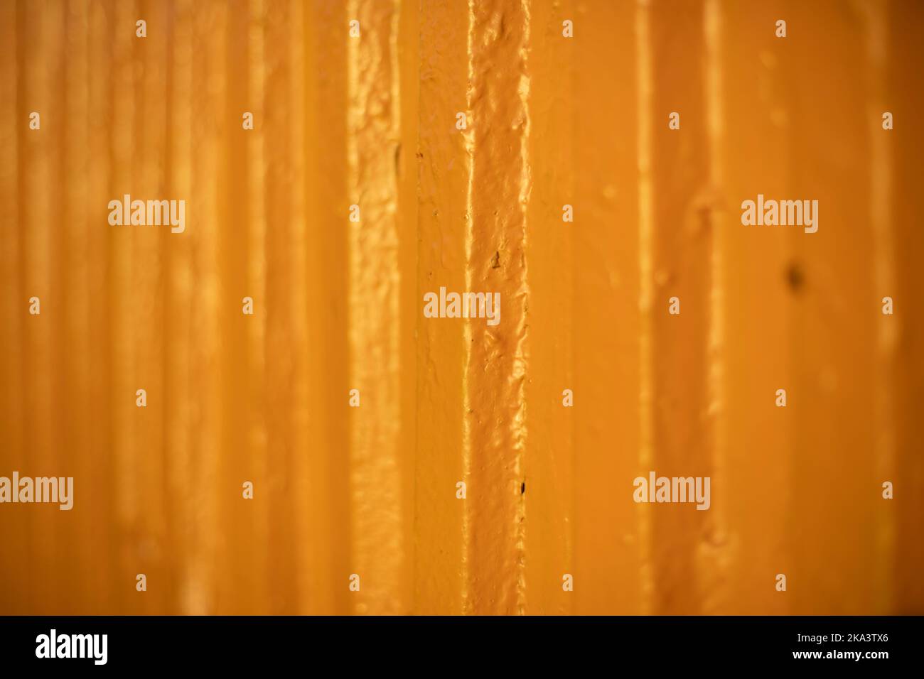 Yellow texture. Painted metal. Surface is ribbed. Thick coat of paint ...