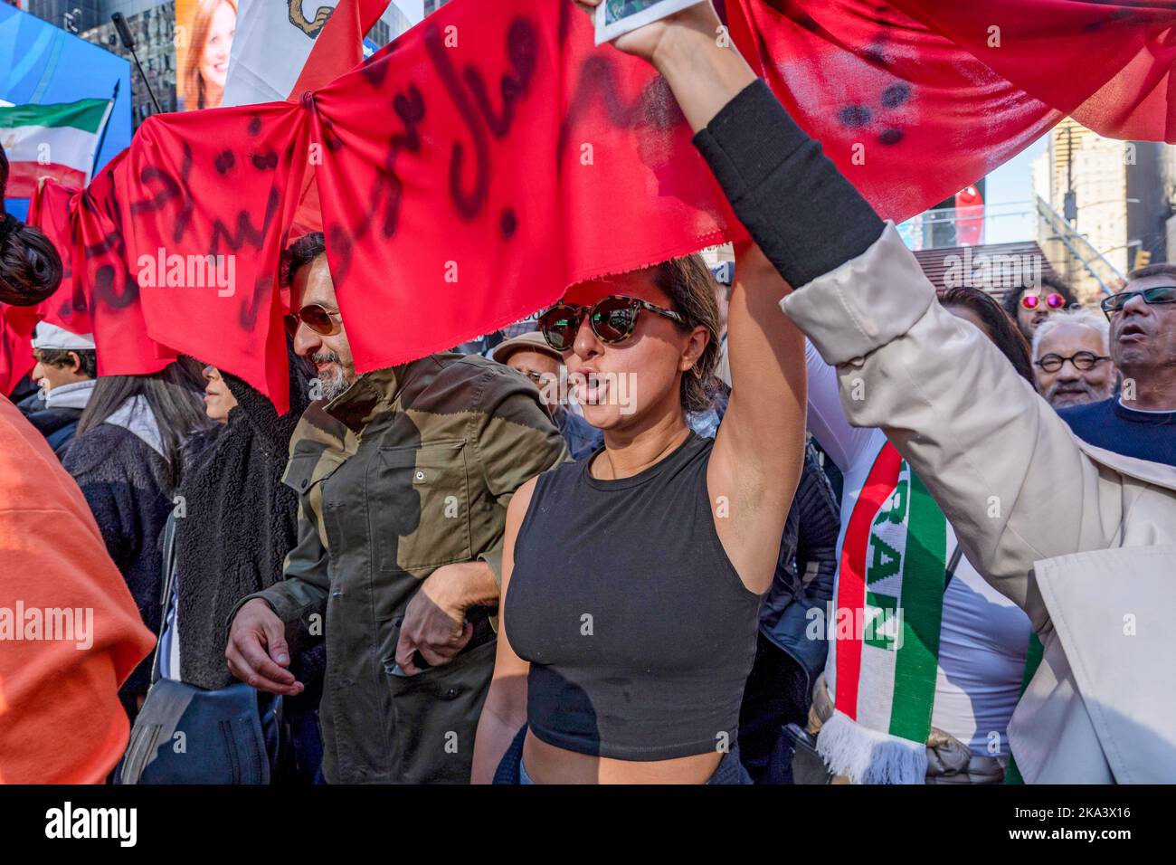 Emotional protesters sing during a protest in Times Square in ...