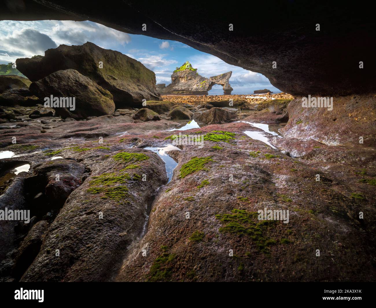 Natural arch and rock formations on Atuh Beach, Nusa Penida island ...