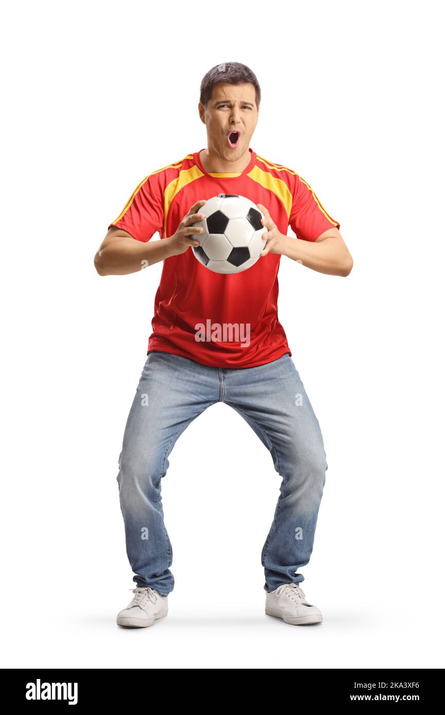 Excited young man holding a football and cheering isolated on white ...