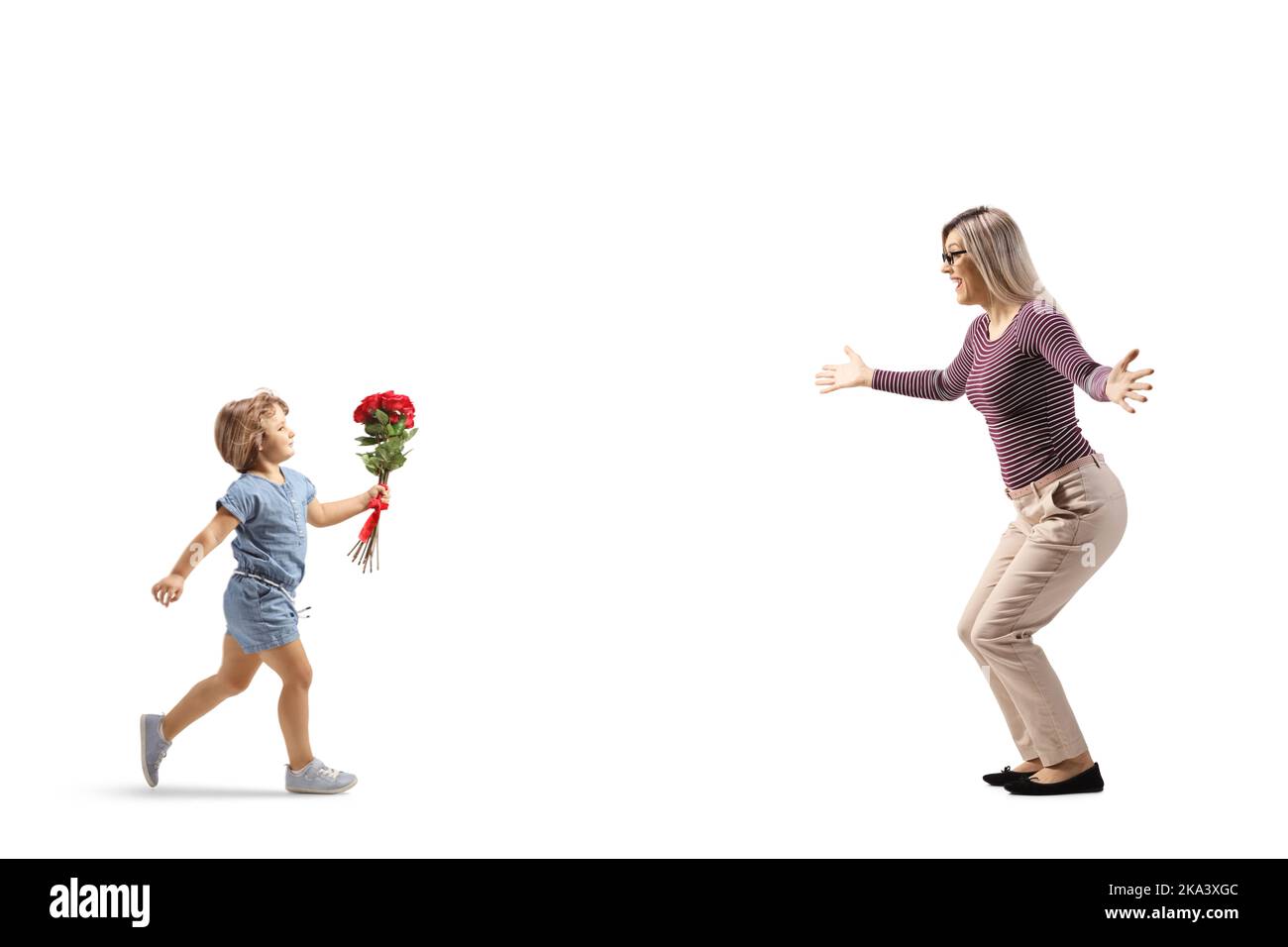 Full length profile shot of a woman waiting to hug a girl with red ...