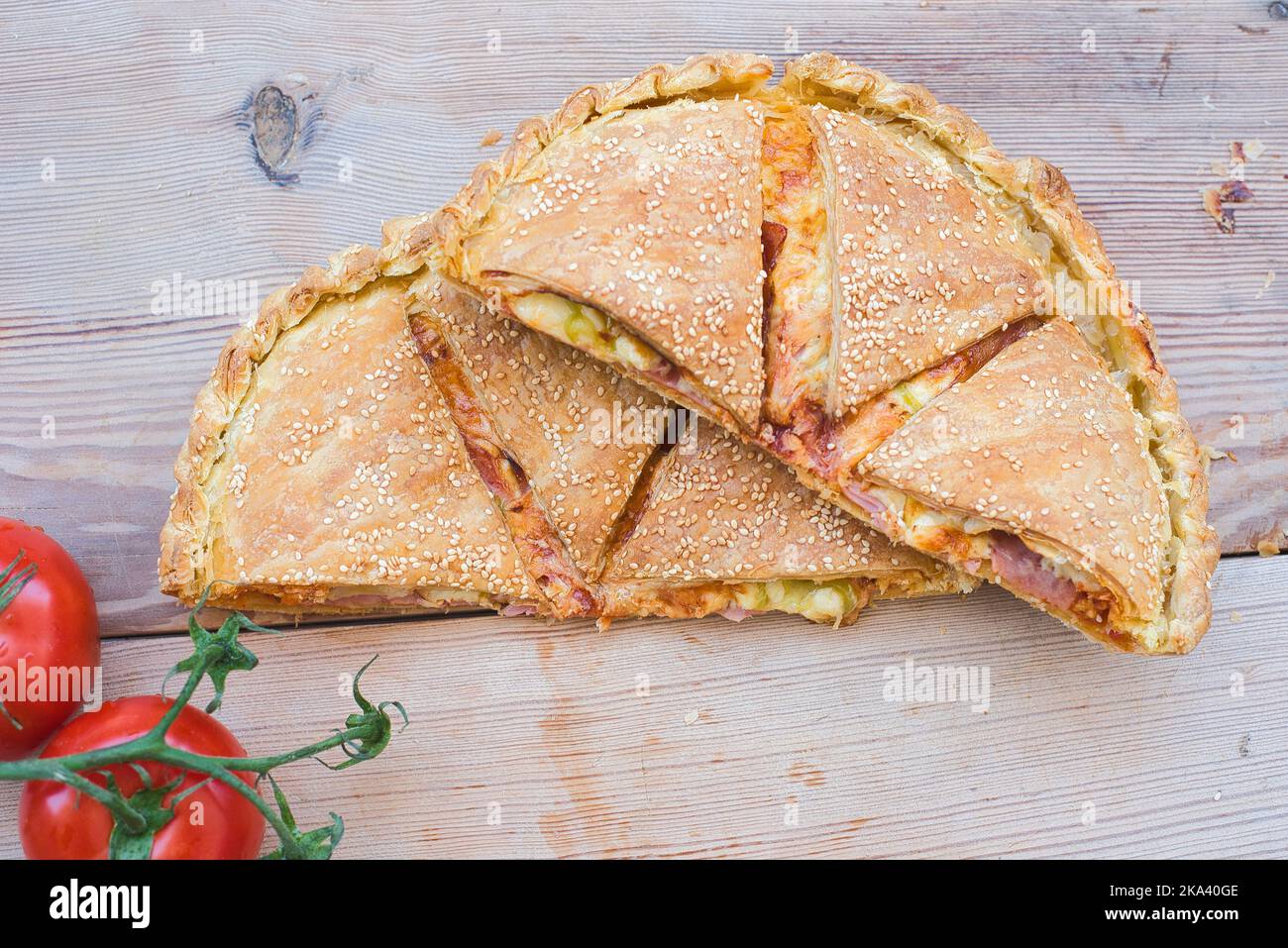traditional pie, covered pizza baked in wood with wood Stock Photo - Alamy