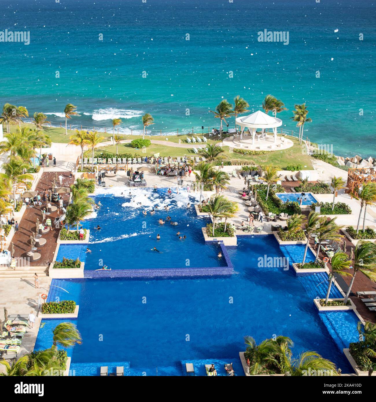 A bubble party at the pool of Hotel Hyatt Ziva overlooking the ocean in ...