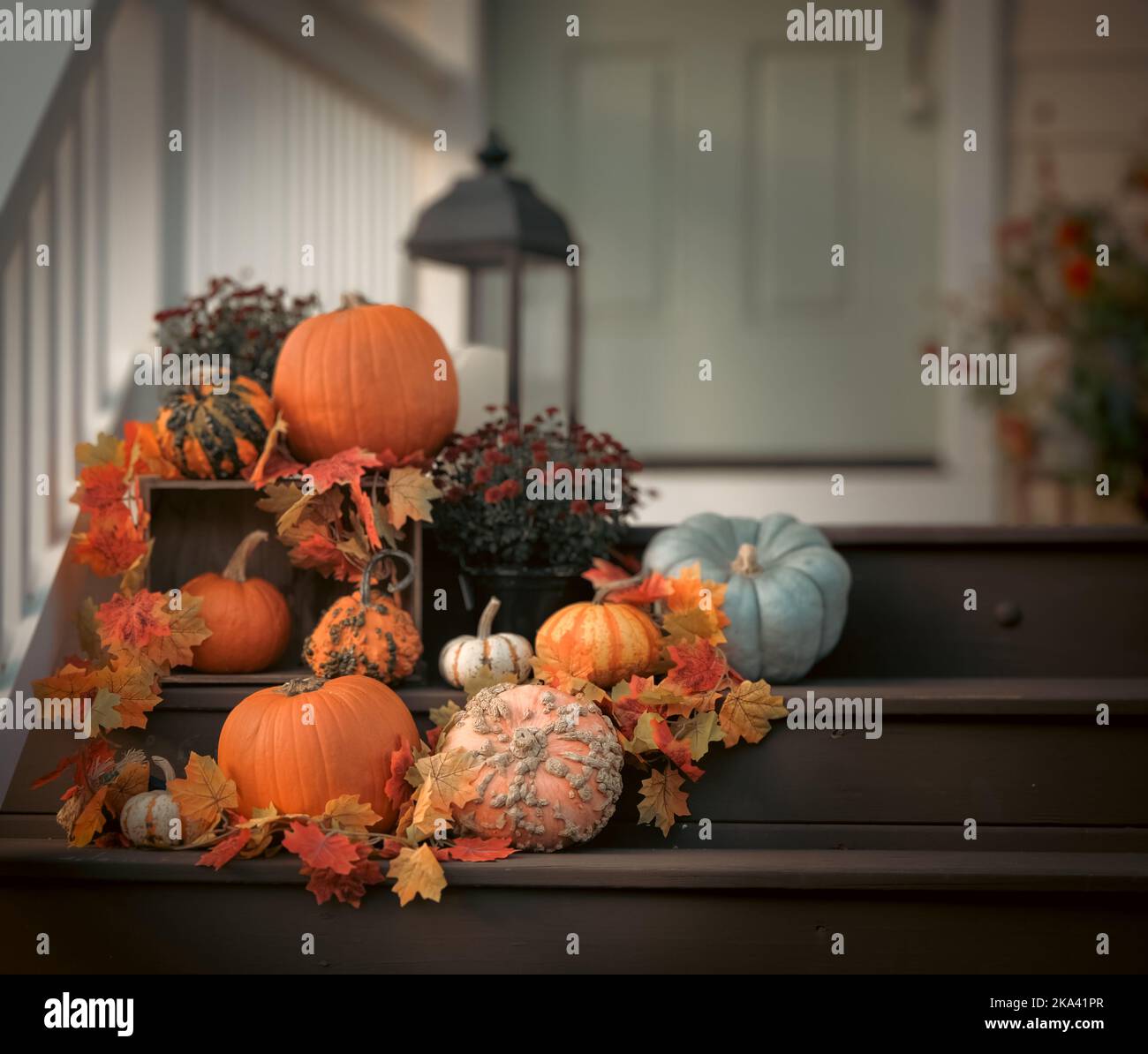 Fall displayed with pumpkins and autumn leaves on front steps Stock ...