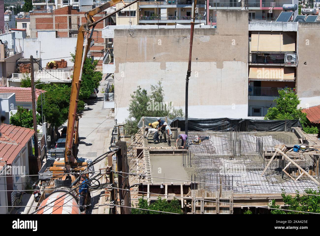construction workers while working in a building under construction ...