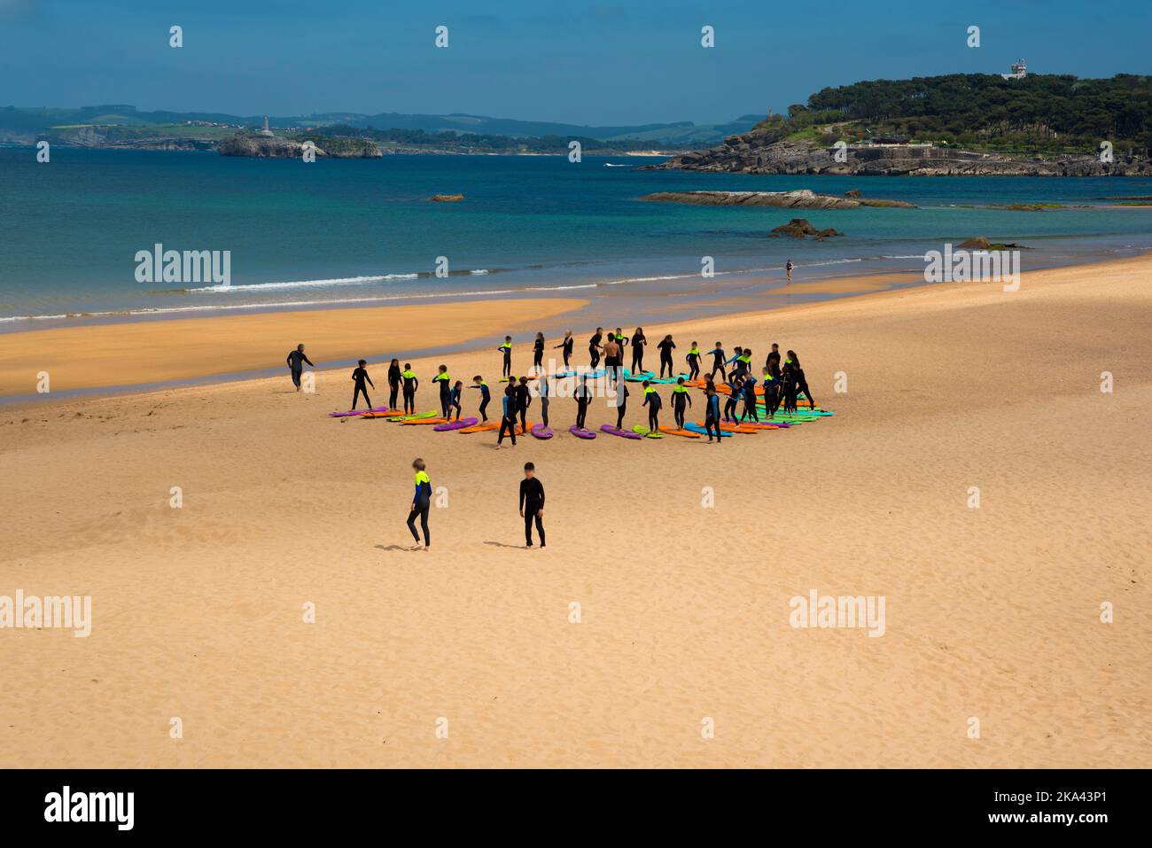People giving a surf class on the Sardinero beach in the Cantabrian Sea ...