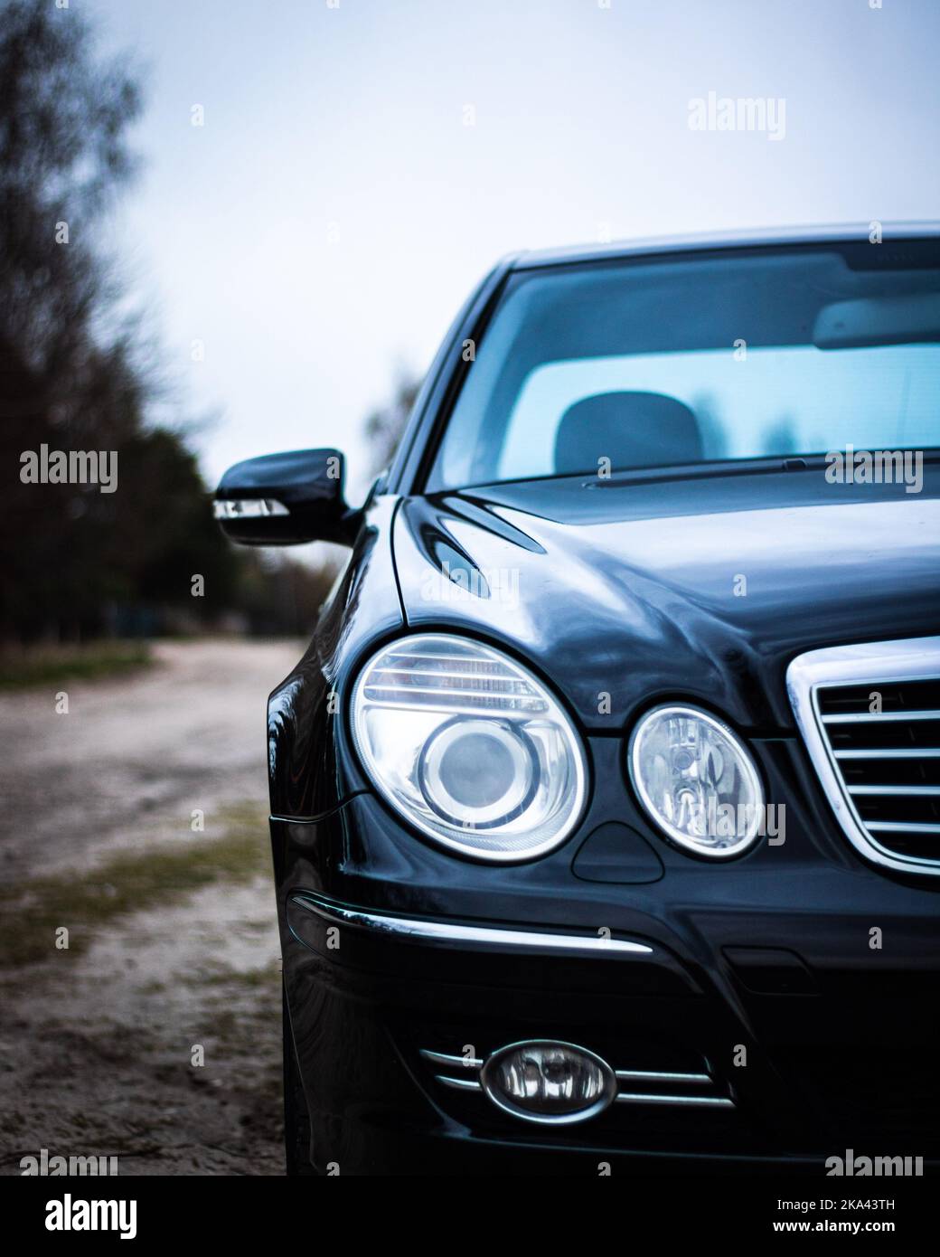 Blue Mercedes Benz E Class W211 with front light, Poland Stock Photo ...